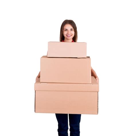 Premium Photo Portrait Of Smiling Delivery Woman Holding Heavy