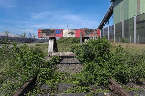 Wooden Buffer Stop With Red Stop Sign Ending Rail Tracks Concept For Wooden Buffer Stop With Red Stop Sign Ending Rail Tracks Concept For