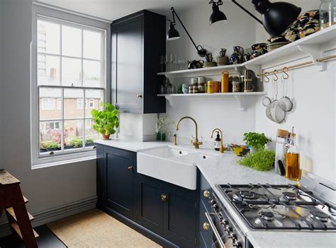 A London Apartment With A Small Blue Devol Kitchen The Nordroom