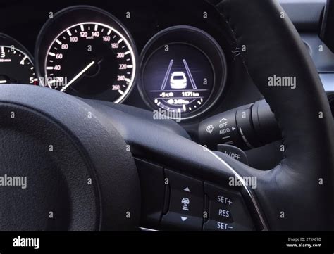 Controls On Steering Wheel And Display Of Collision Avoidance System On