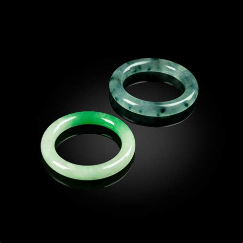 At Auction Chinese Jadeite And Quartz Bangles