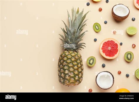 Composition With Different Fruits And Berries On Color Background Stock