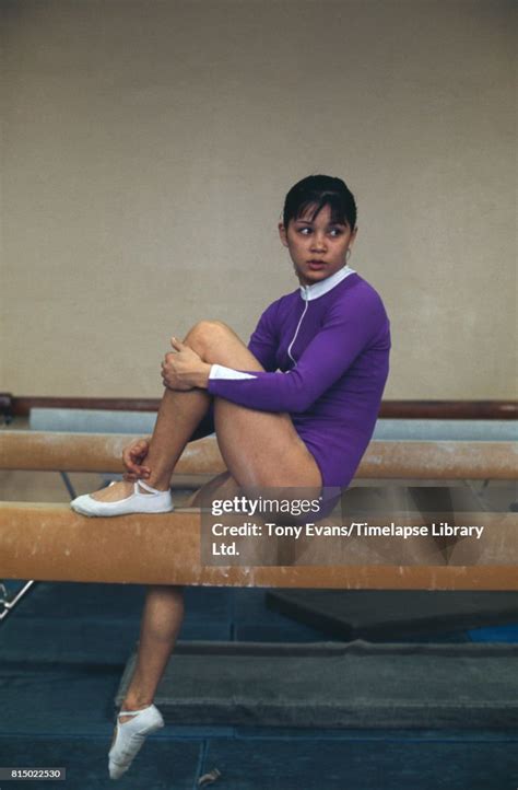 Soviet Gymnast And Olympic Gold Medalist Nellie Kim Poses On A News