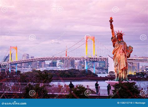 Odaiba Rainbow Bridge And Statue Of Liberty With Tokyo Bay View At
