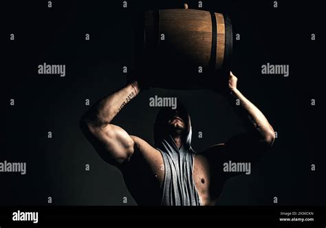 Muscular Man Wooden Barrel On Black Brutal Brewer Man Brewery Concept