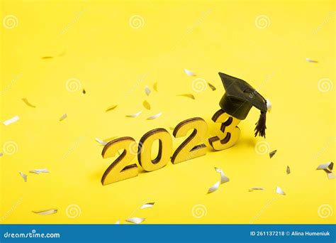 Class Of 2023 Concept Numbers 2023 With Black Graduated Cap On Yellow