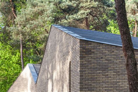 Angular Brick Clad Theatre By Reset Architecture Sits In A Woodland
