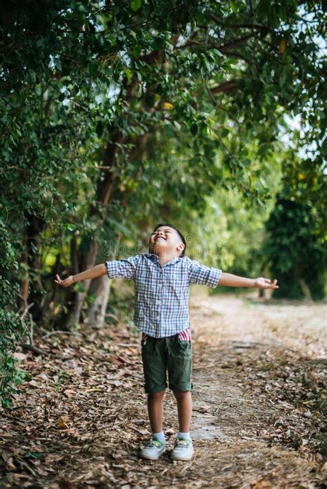 Happy Boy Sitting And Thinking Alone Stock Image Image Of Cute
