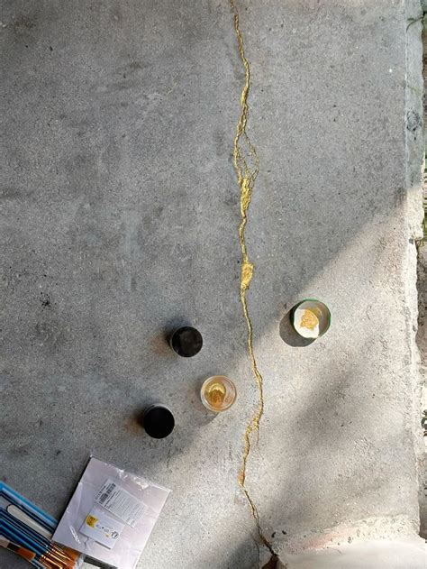Kintsugi On Concrete Floor In 2025 Kintsugi Concrete Floors Coffee Shop Design