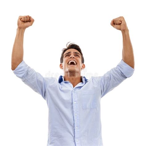 Feeling The Relief A Handsome Young Man Looking Up With Arms Raised In