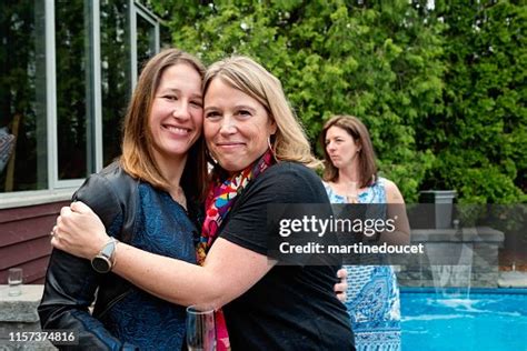 Portrait Of Mother And Stepdaughter Outdoor In Summer High Res Stock