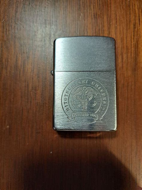 ジッポライター 一橋大学の校章付き メルカリ