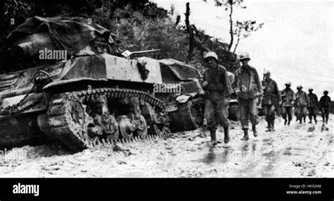 The 77th Division Infantry Men Okinawa Represents A Scene From World