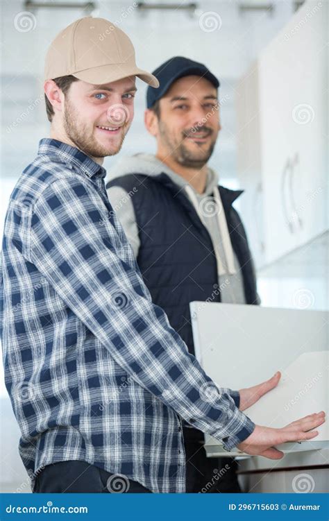 Two Men Assembling Kitchen Furniture Stock Image Image Of Improvement Person 296715603