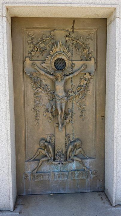 Ornate Tomb Door With Crucifix