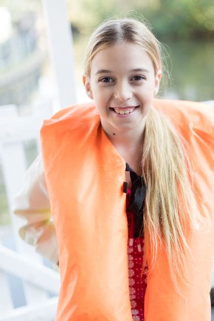 Free Photo Smiling Girl Waiting For The Boat Ride