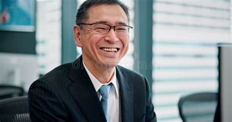 Computer Face And Laughing With Japanese Businessman In Office For