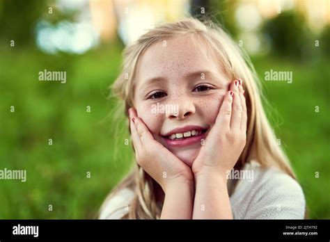 The Best Days Are Spent Outdoors Portrait Of A Young Girl Enjoying