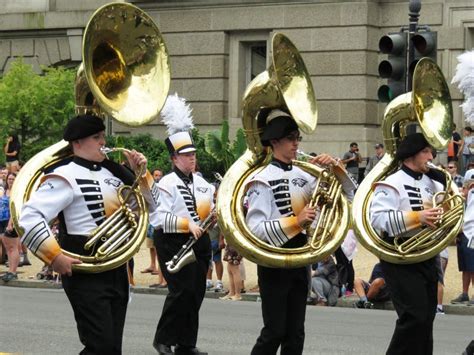 Tuba Players From Brass Or Maching Band Playing Live Music Durin
