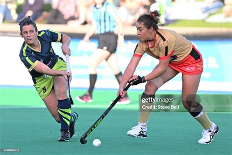 Kiah Williams Of The Tasmanian Tigers Passes The Ball During The