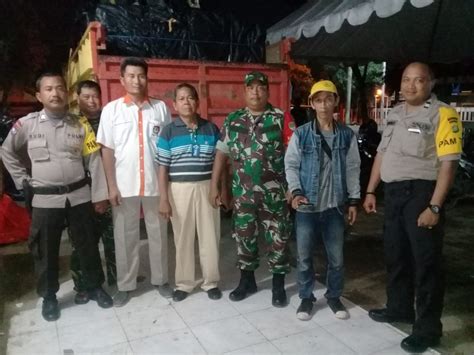Babinsa Dan Bimaspol Desa Sindang Mulya Kawal Kotak Suara Menuju Kpu