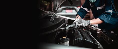 Premium Photo Car Care Maintenance And Servicing Closeup Hand