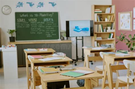 Well Organized Classroom With Study Materials On Tables Stock Image