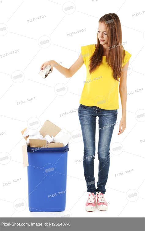 Young Girl Sorting Paper And Cardboard Isolated On White Stock