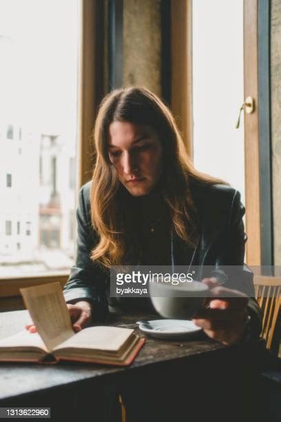 Happy Book Reader Photos And Premium High Res Pictures Getty Images