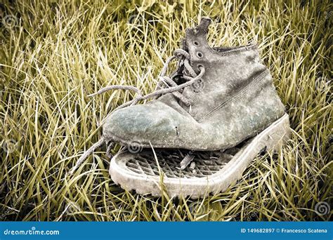 Old Broken Boot Abandoned In A Grass Carpet Stock Image Image Of