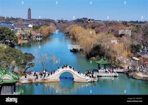 Aerial Photo Shows Tourists Visiting The Slender West Lake Scenic Area