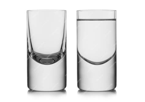 Premium Photo Luxury Crystal Empty And Full Shot Glasses Of Vodka And