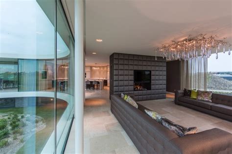 Corian Facade Wraps Around Waterside Dutch Home