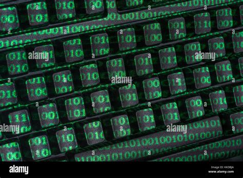 black qwerty keyboard green binary 0 s and 1 s surface projected