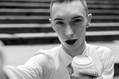 Premium Photo Portrait Of Young Man Holding Coffee