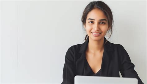 Premium Photo Indian Female Assistant Working On A Laptop Wearing