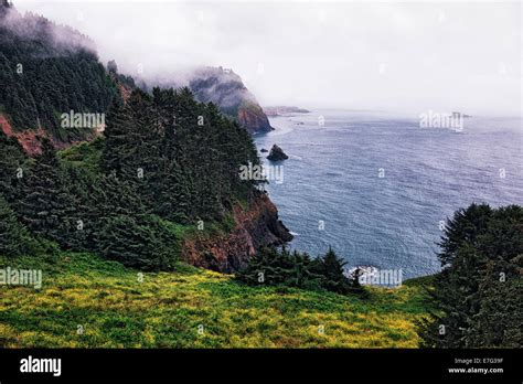 Summer Fog Lifts Along Oregons Central Coast Revealing The Otter Crest