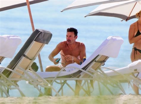 Ryan Seacrest Goes Shirtless As He Flexes His Muscles On Miami Beach With Girlfriend Aubrey