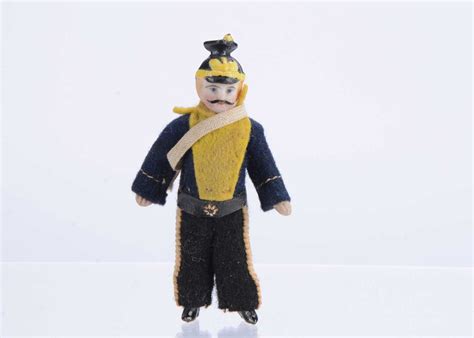A Late 19th All Bisque Dolls House Soldier Doll Possibly Prussian