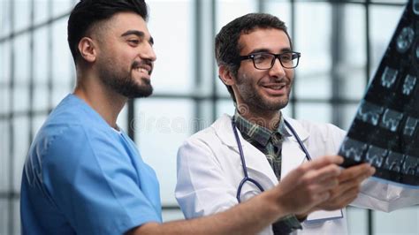 Two Male Doctors Looking At Brain X Ray Stock Image Image Of Radiology Hospital 287304253