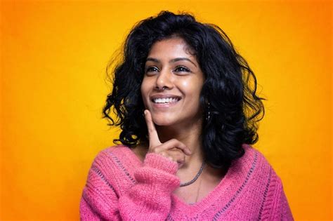 Premium Photo Beautiful Sri Lanka Girl Poses Standing With Yellow