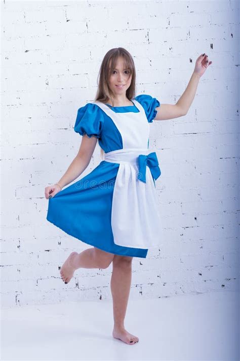Young Woman Dressed As Alice In Wonderland Stock Image Image Of
