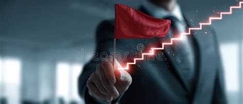 The Business Leader Holding A Red Flag Symbolizing Growth And Analytics