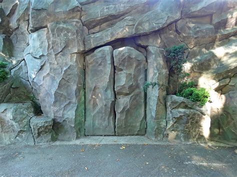 Premium Photo Decorative Rock Doors Disguised With Rock Texture Aged