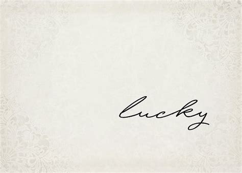 The Word Lucky Is Written In Cursive Writing