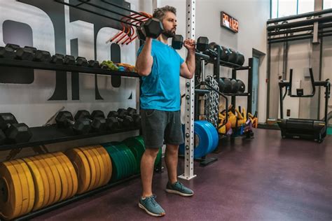 Premium Photo Heavy Weights Sportsman Working With Heavy Weights In