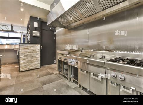 Spacious Well Equipped Commercial Kitchen Featuring Stainless Steel