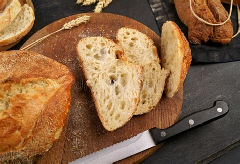 Fresh Bread Slice And Cutting Knife On Rustic Table Concept Of Homemade Bread Natural Farm
