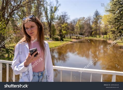 32 Close Hair Style Young Beautiful Teenager Girl Posing Against Summer