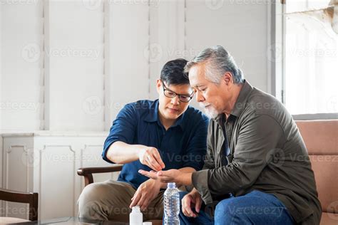 Middle Aged Son Takes Care Of Sick Senior Father Happiness Asian